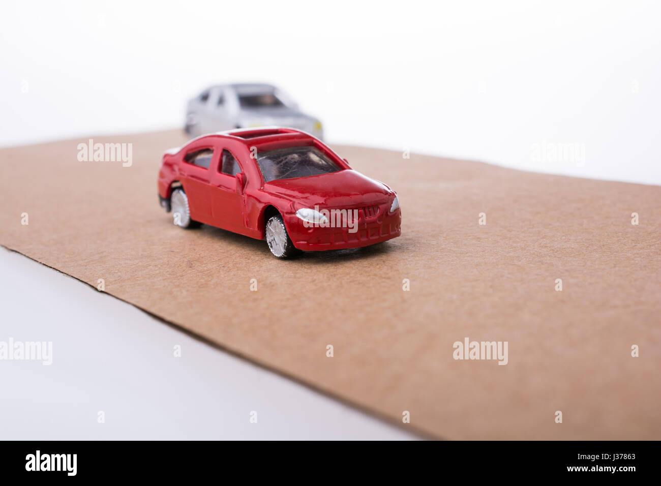Colorful little toy cars on white background Stock Photo - Alamy