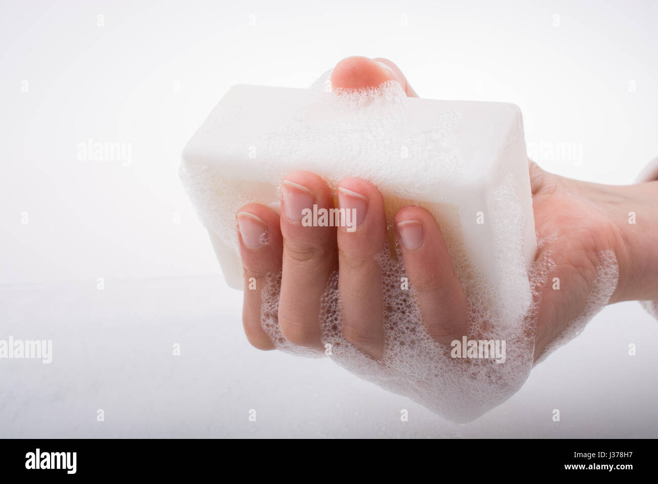 Hand washing and soap foam on a foamy background Stock Photo - Alamy