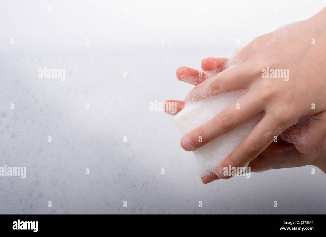 Hand washing and soap foam on a foamy background Stock Photo - Alamy