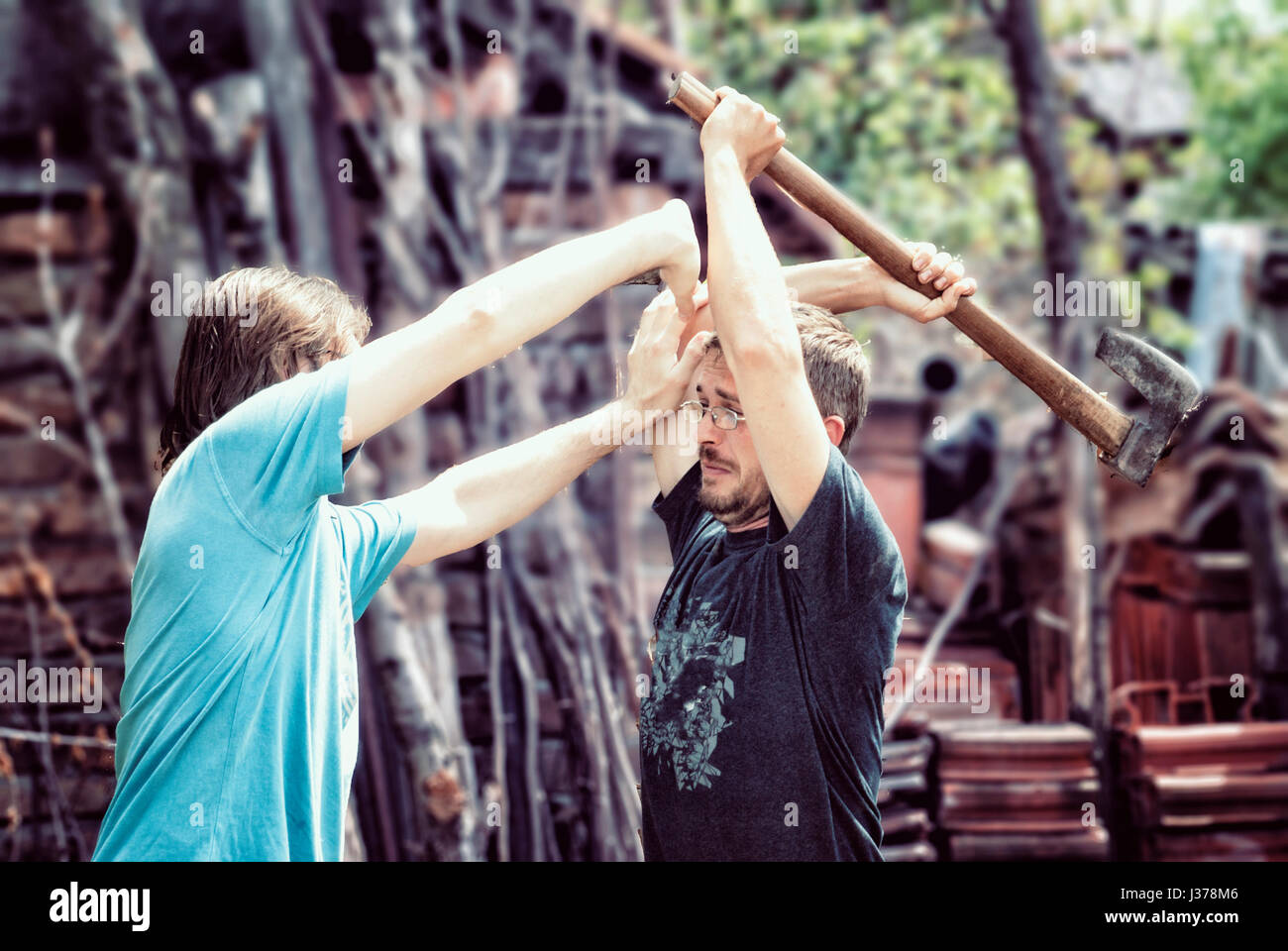 Swinging axe hi-res stock photography and images - Alamy