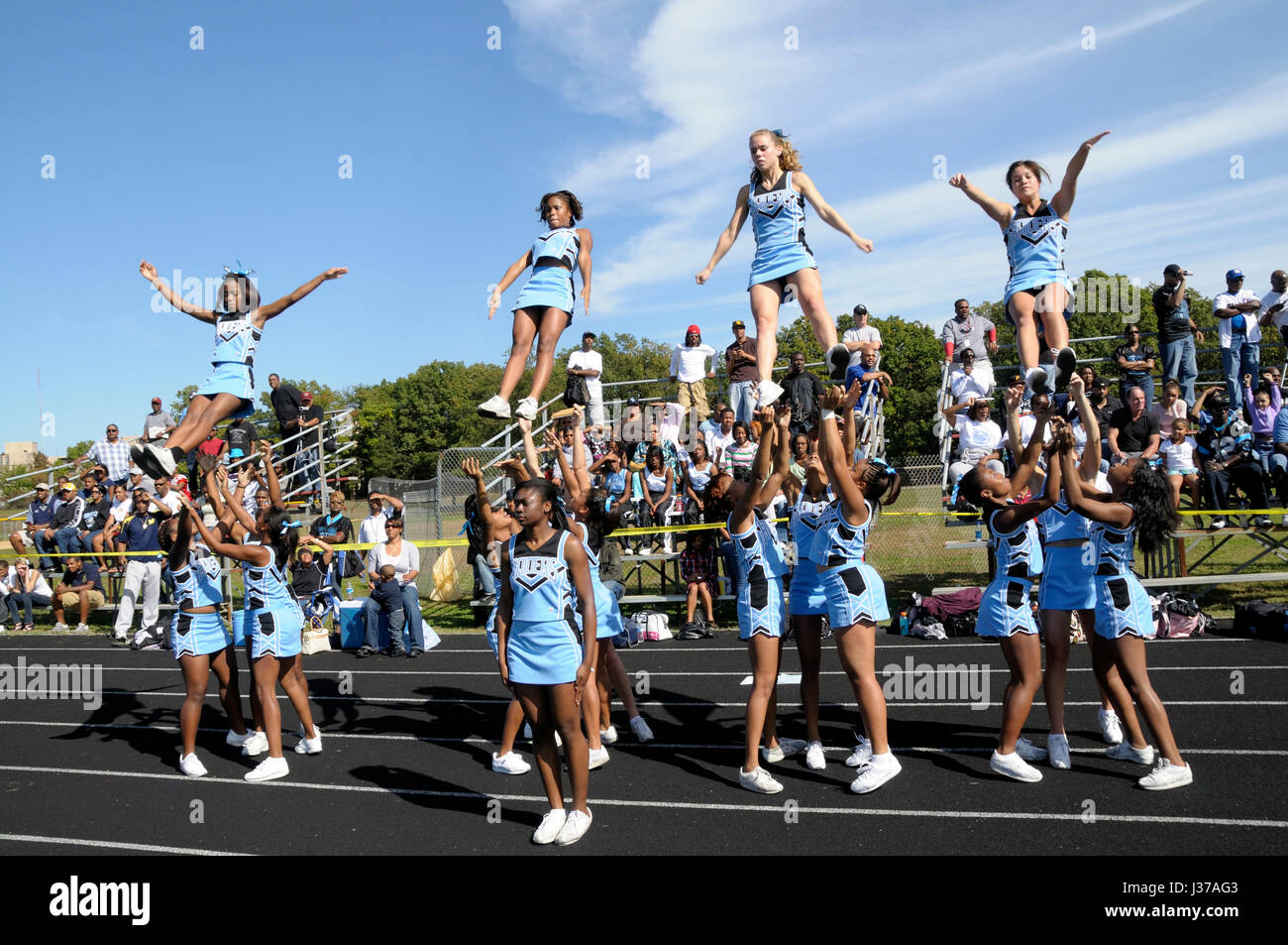 cheerleaders perform at a football game Stock Photo - Alamy