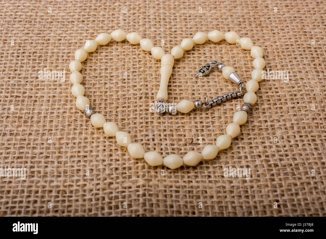 Praying beads of the certain color Stock Photo - Alamy