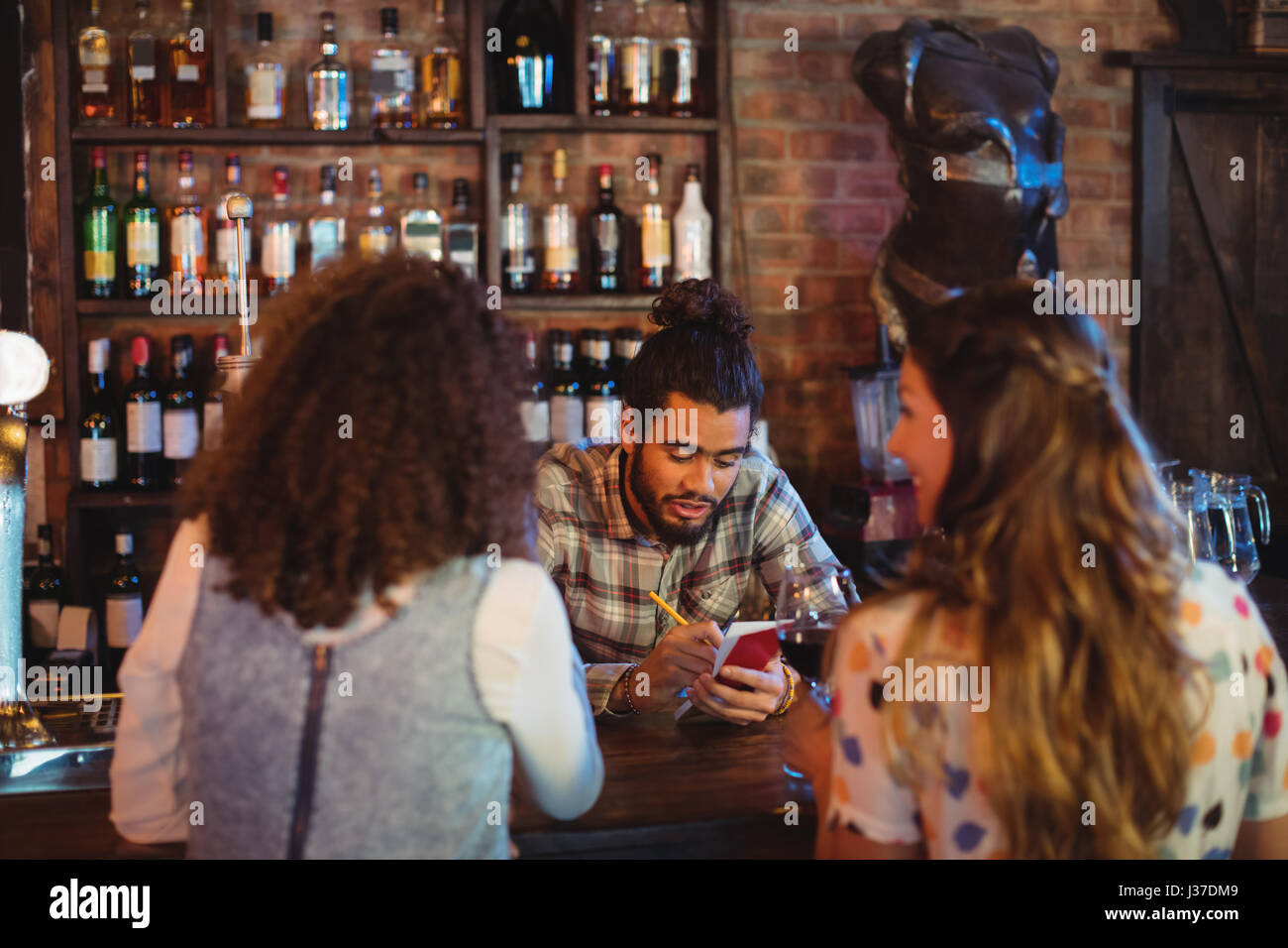 Bartender Taking Order High Resolution Stock Photography and Images - Alamy