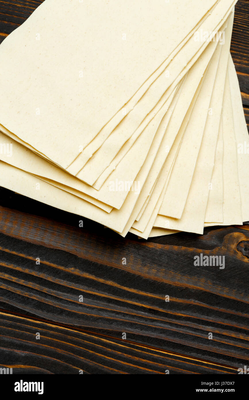 dried uncooked lasagna pasta sheets Stock Photo - Alamy