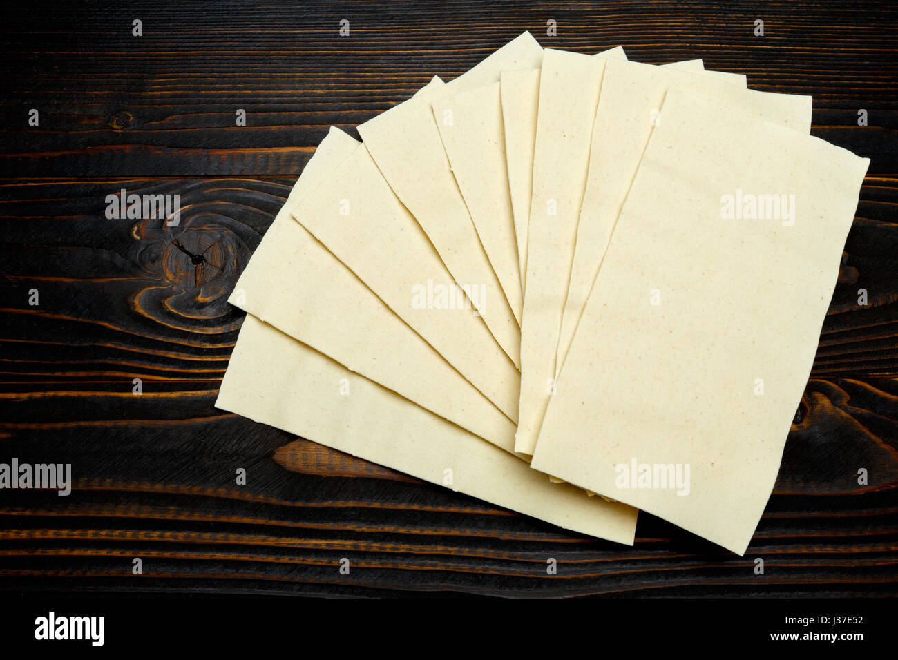 dried uncooked lasagna pasta sheets Stock Photo - Alamy