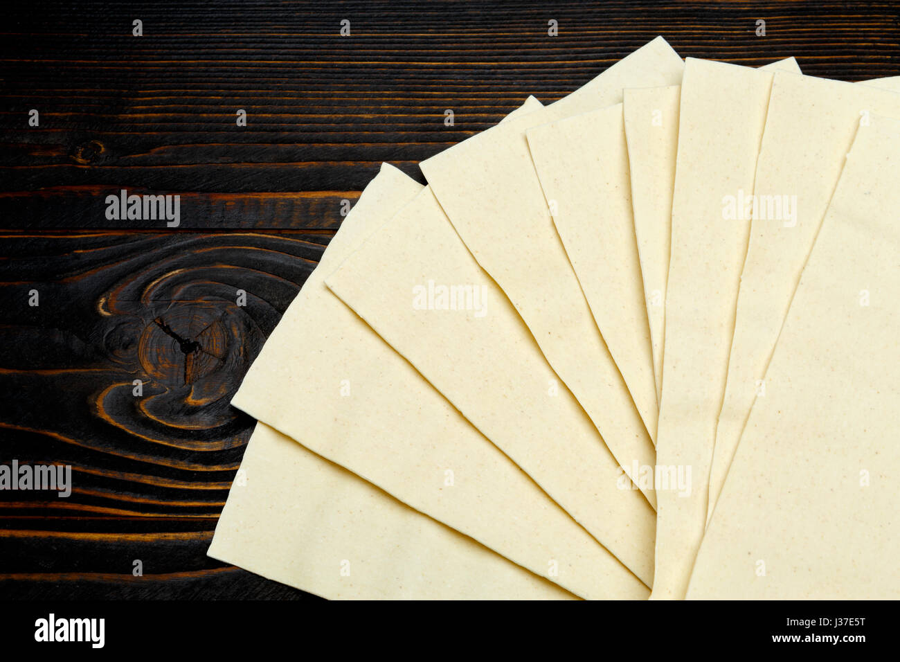 dried uncooked lasagna pasta sheets Stock Photo - Alamy