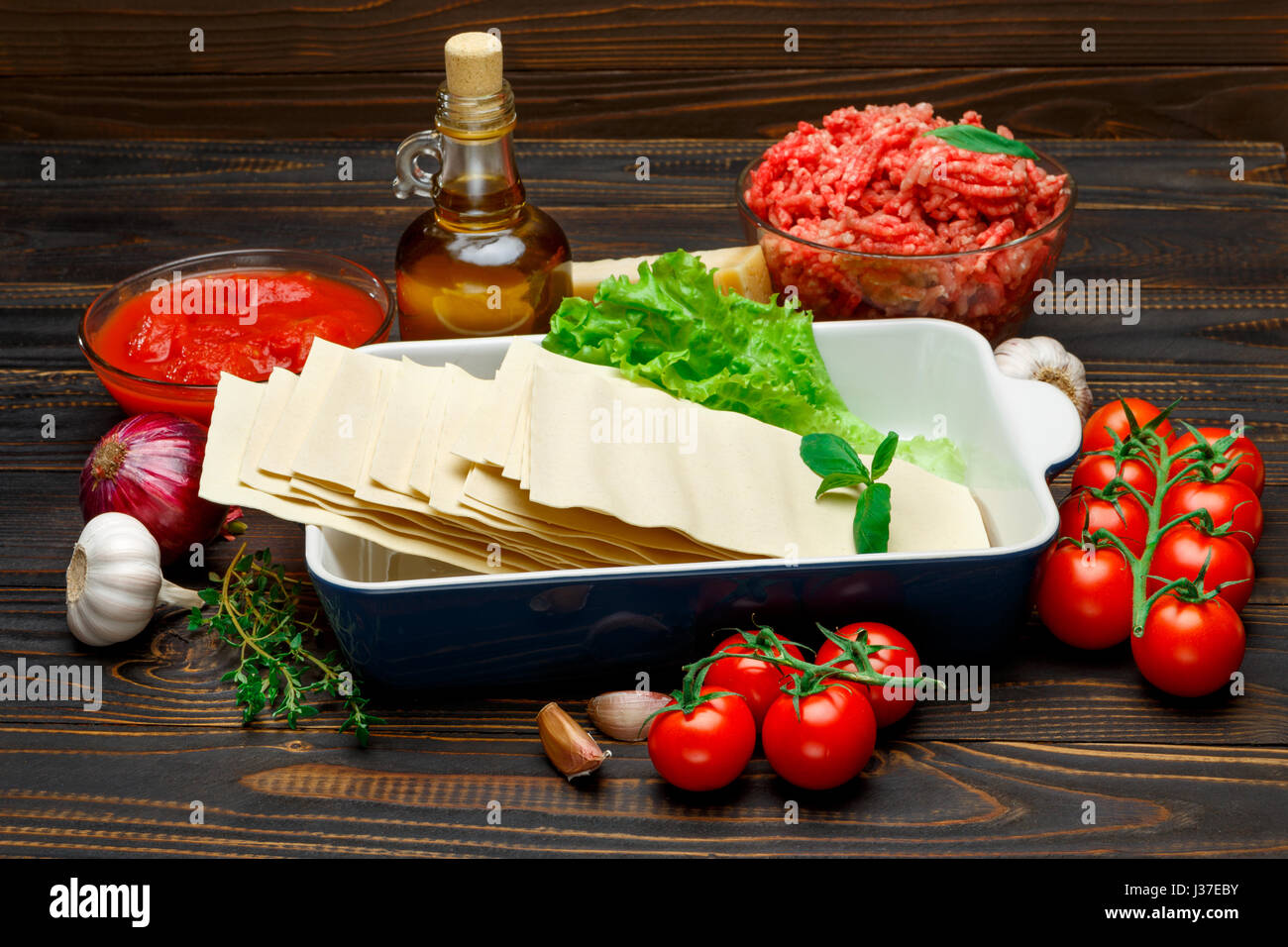 dried uncooked lasagna pasta sheets and ingridients Stock Photo - Alamy
