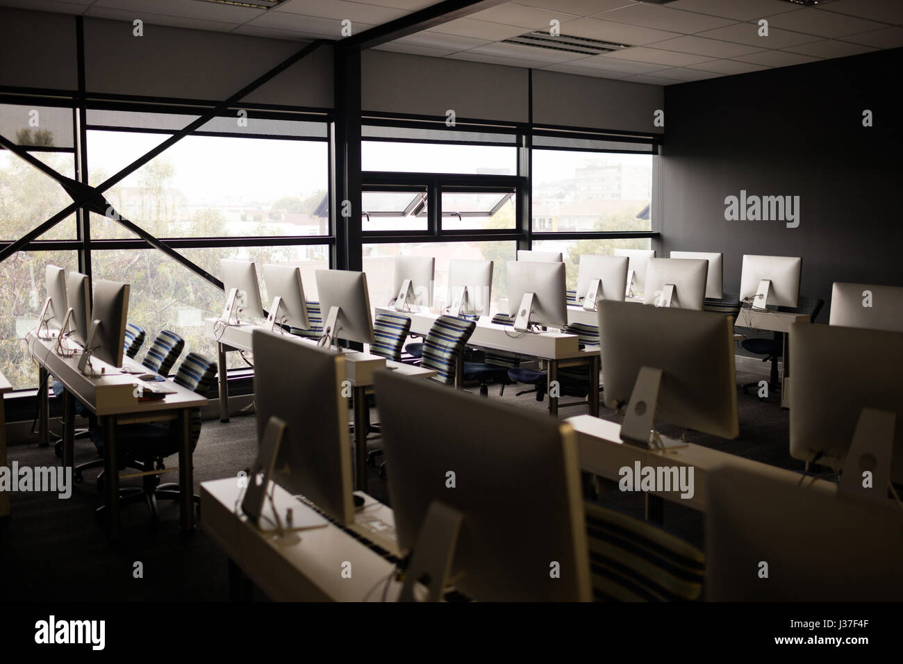 Empty recording studio with chairs and computers Stock Photo - Alamy