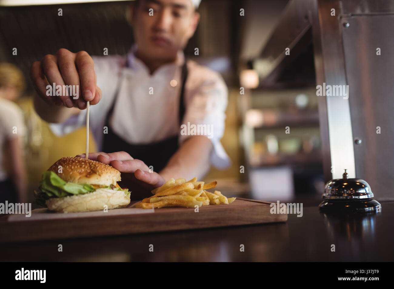 Tooth pick in burger hi-res stock photography and images - Alamy
