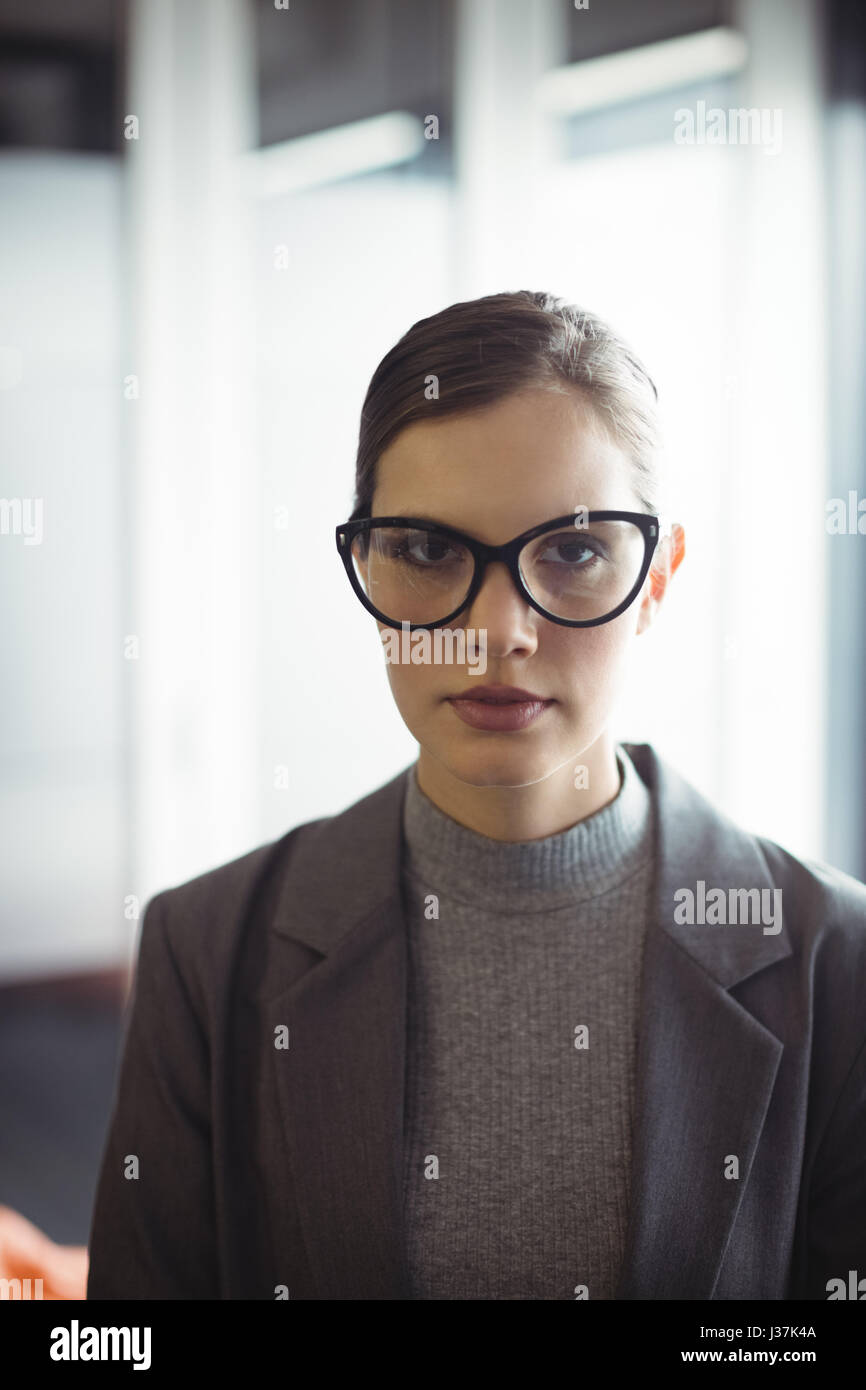 Portrait of counselor in glasses at office Stock Photo - Alamy