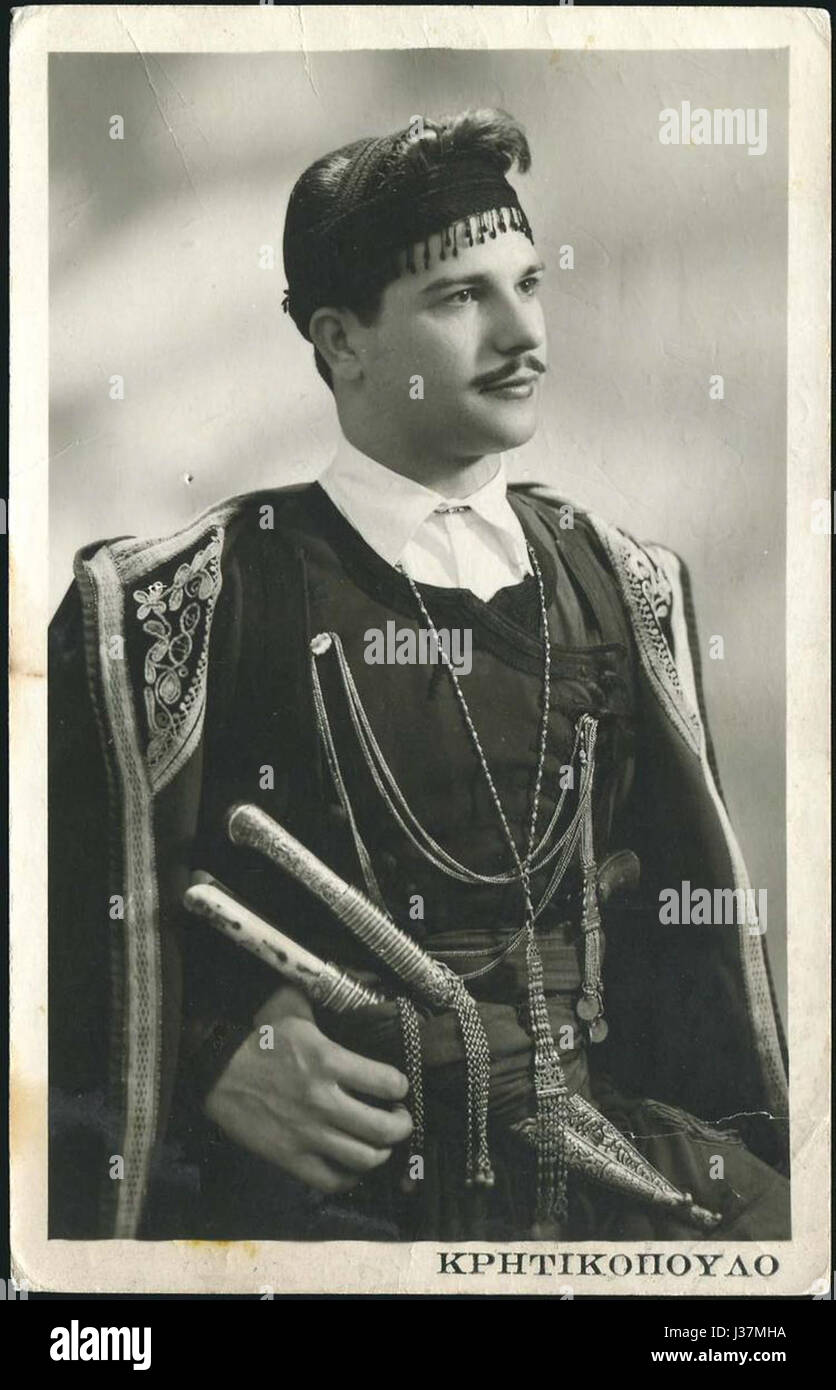 This image depicts a traditional Cretan man, likely representing the ...
