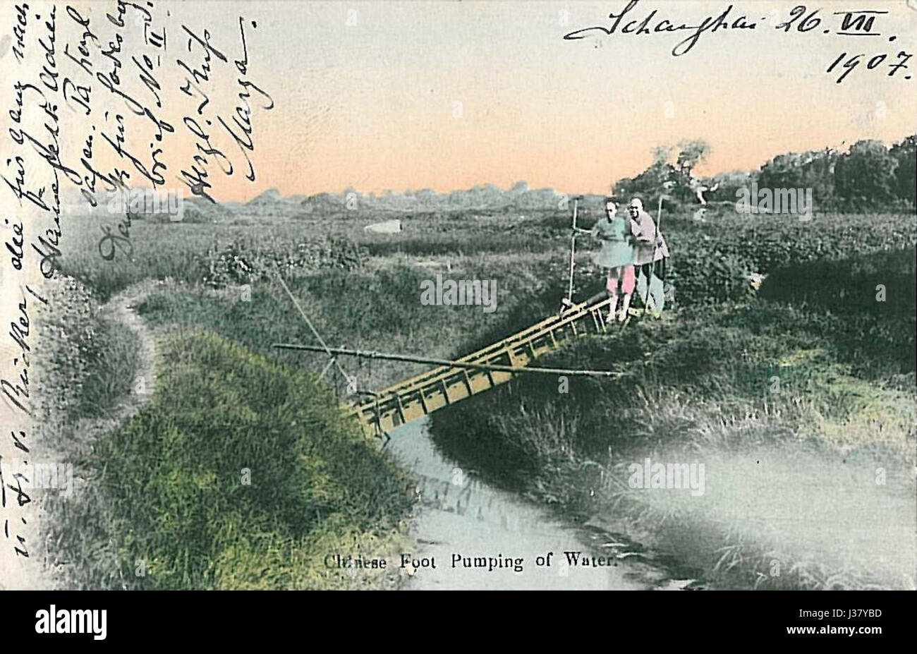 An early 20th-century image showing a traditional Chinese method of ...