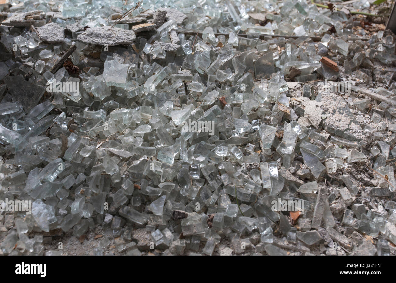Broken glass crystals close up background Stock Photo - Alamy