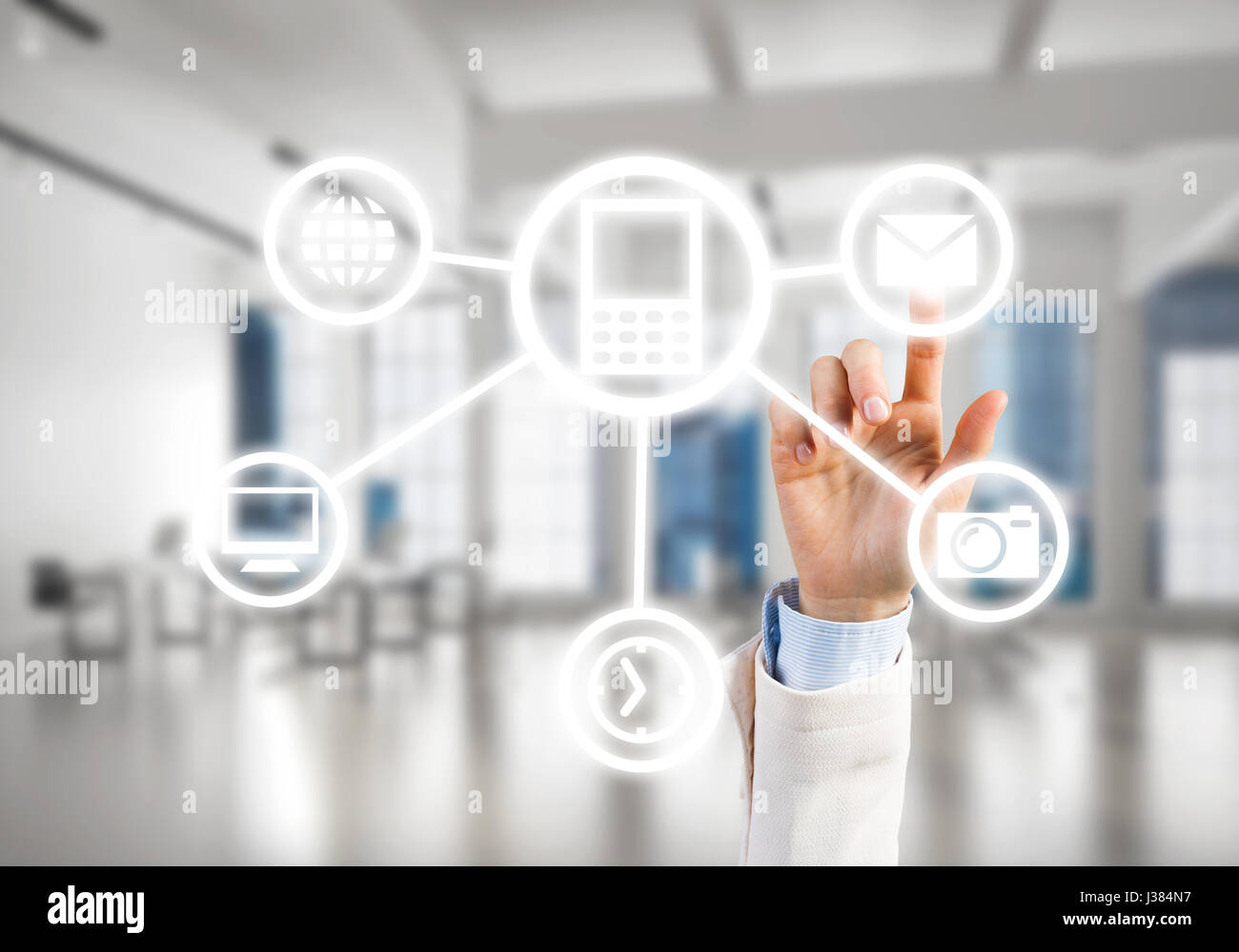 Modern office interior and close of businesswoman hand choosing symbol ...