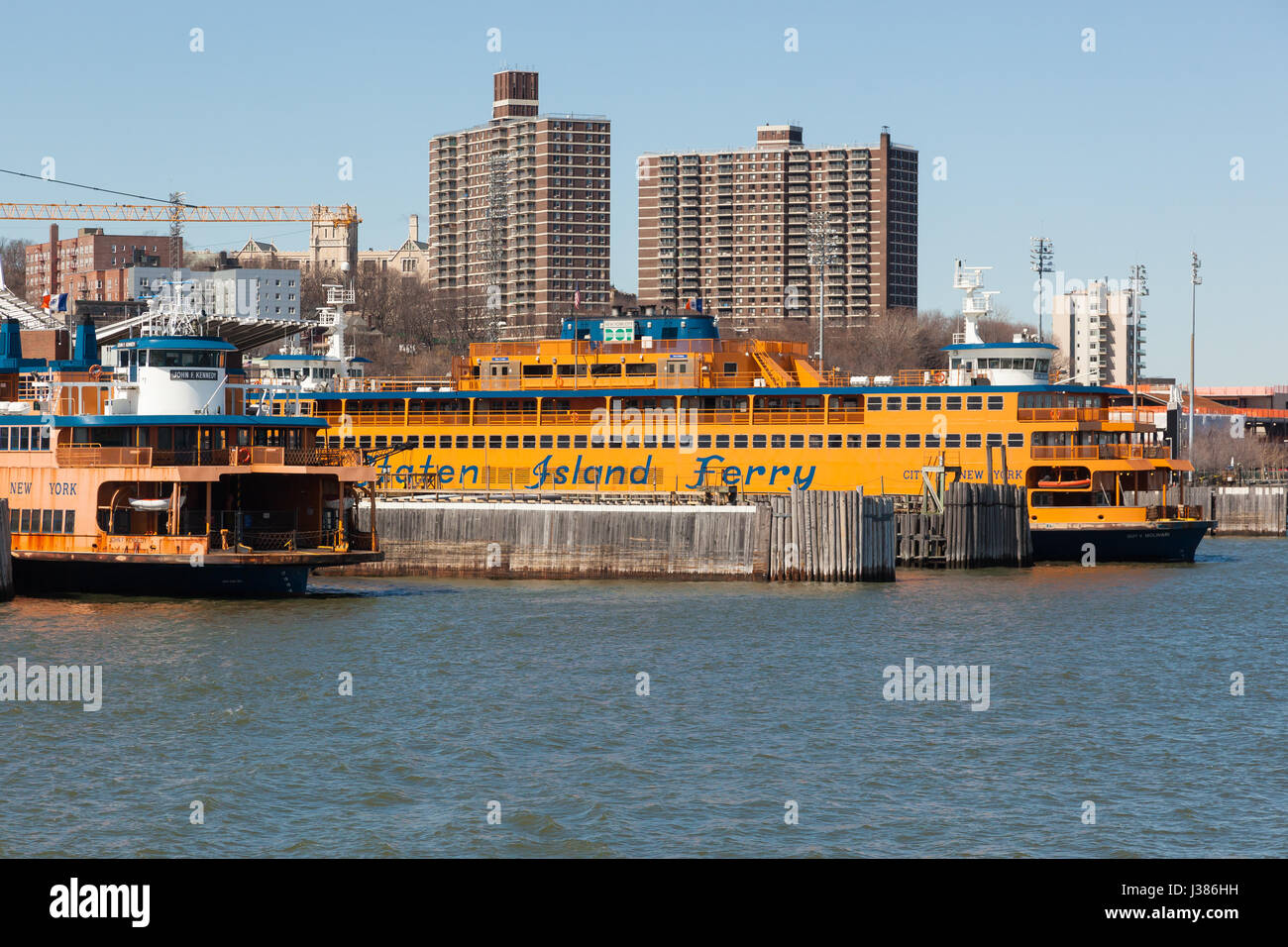 STATEN ISLAND, NEW YORK - March 29, 2017: Ferries are docked at St ...