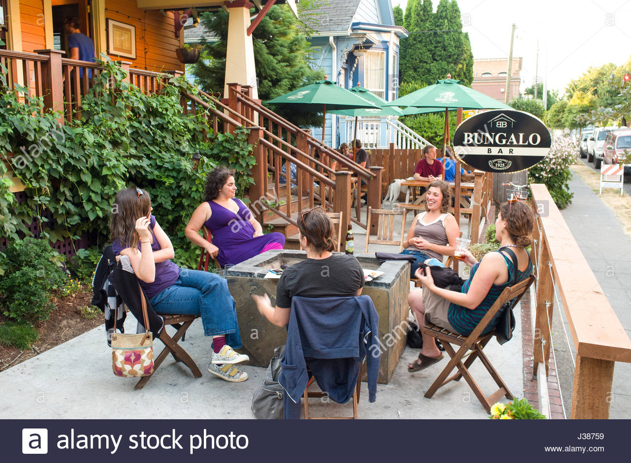 Sitting Around Fire Pit Stock Photos & Sitting Around Fire Pit Stock ...