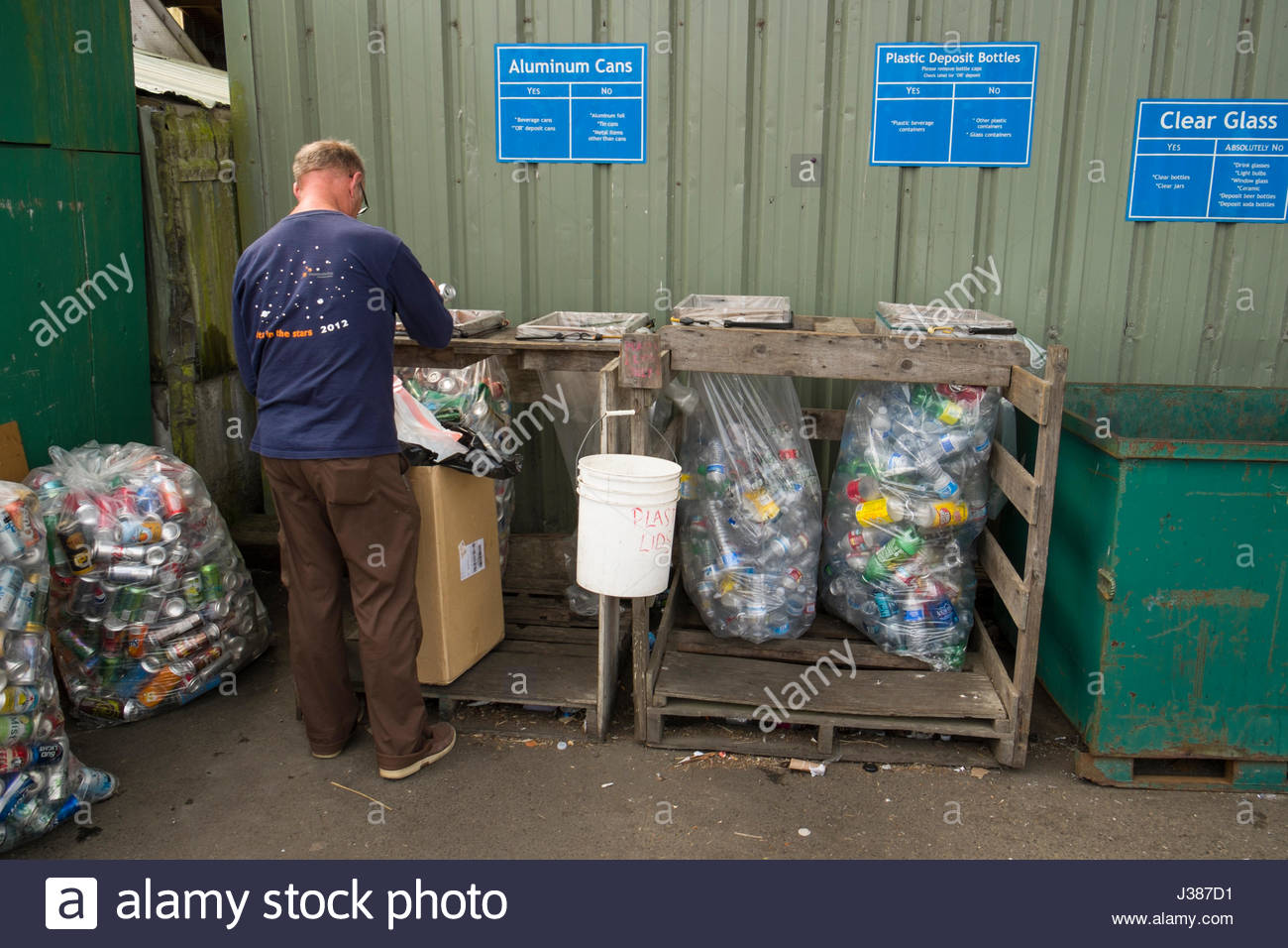 Man Sorting Recycling High Resolution Stock Photography and Images - Alamy
