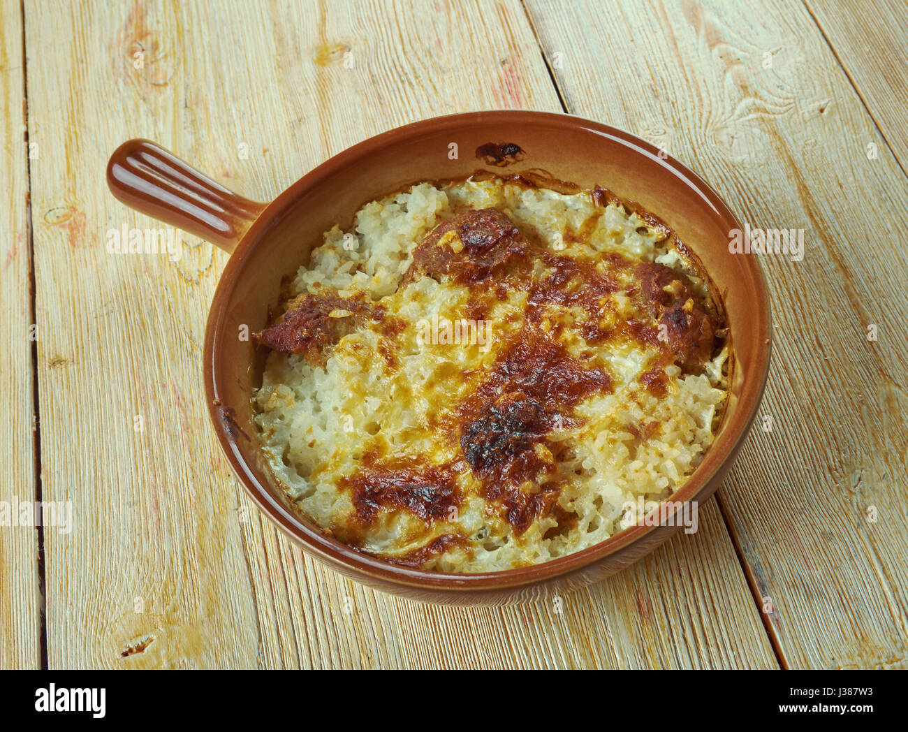 Tave kosi - baked lamb and rice with yoghurt. national dish in Albania ...