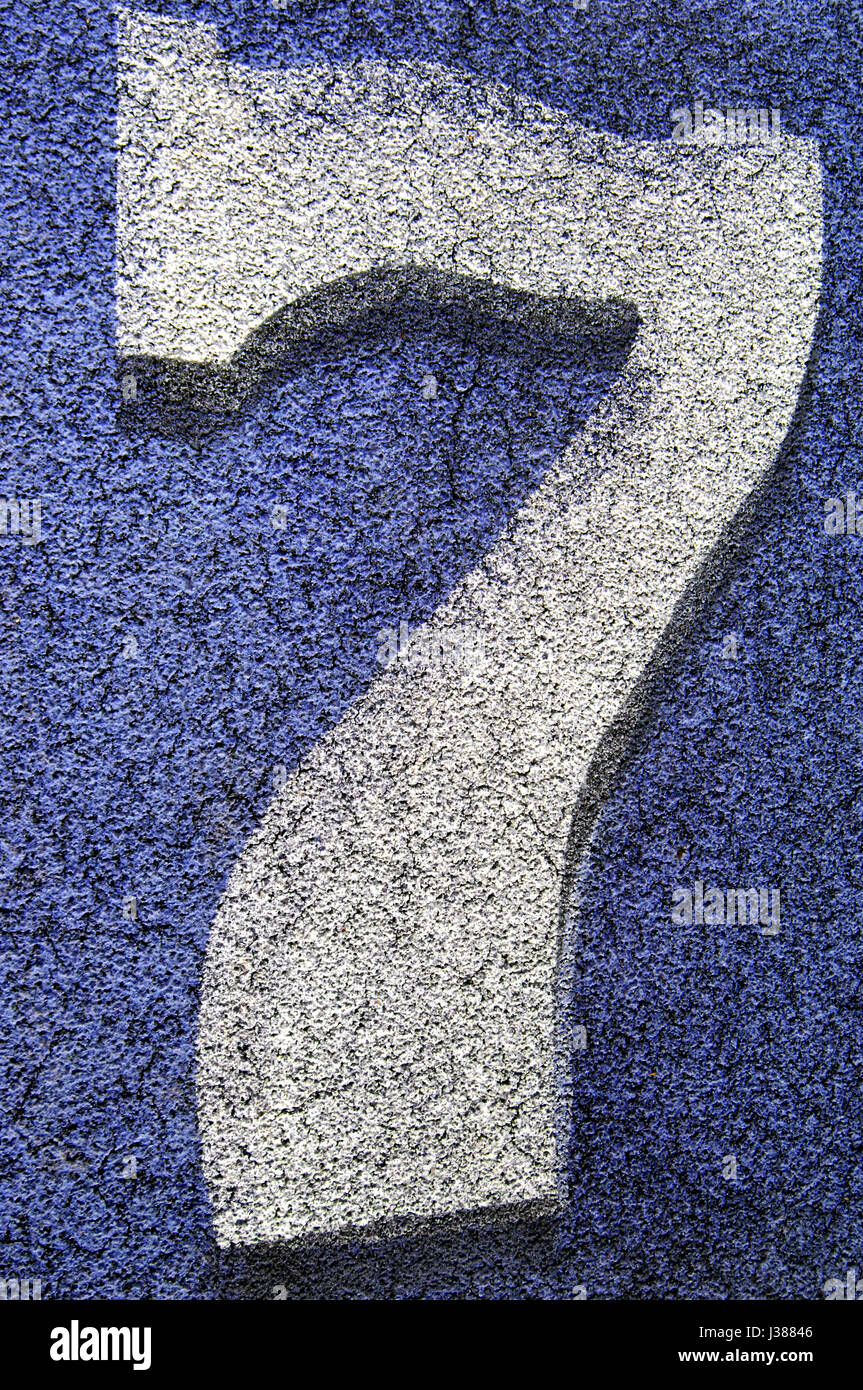 The number 7 is spray painted onto a commercial grade surface at a ...