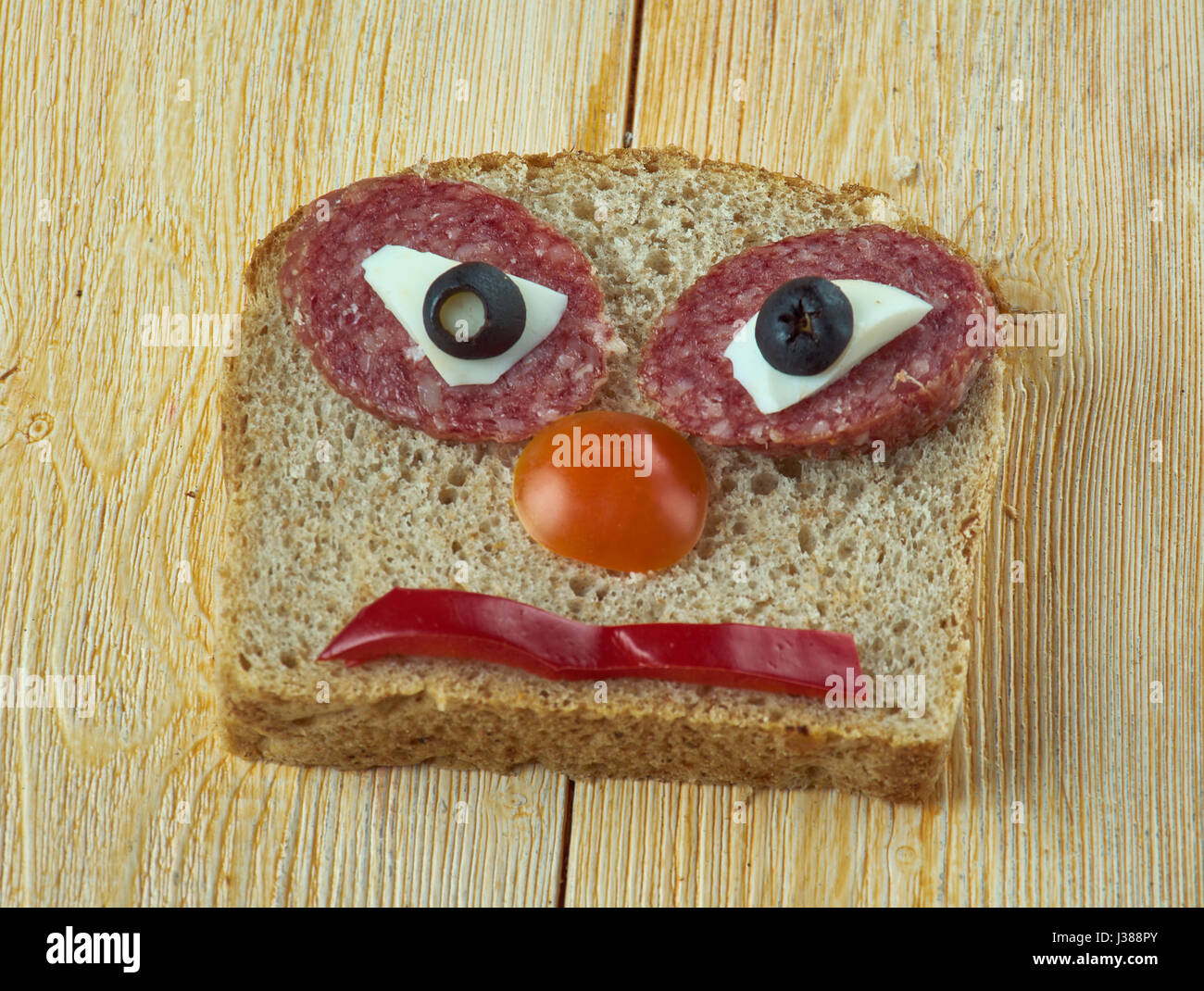 creative food concept - Funny sandwich for kids man made of Bread Stock ...