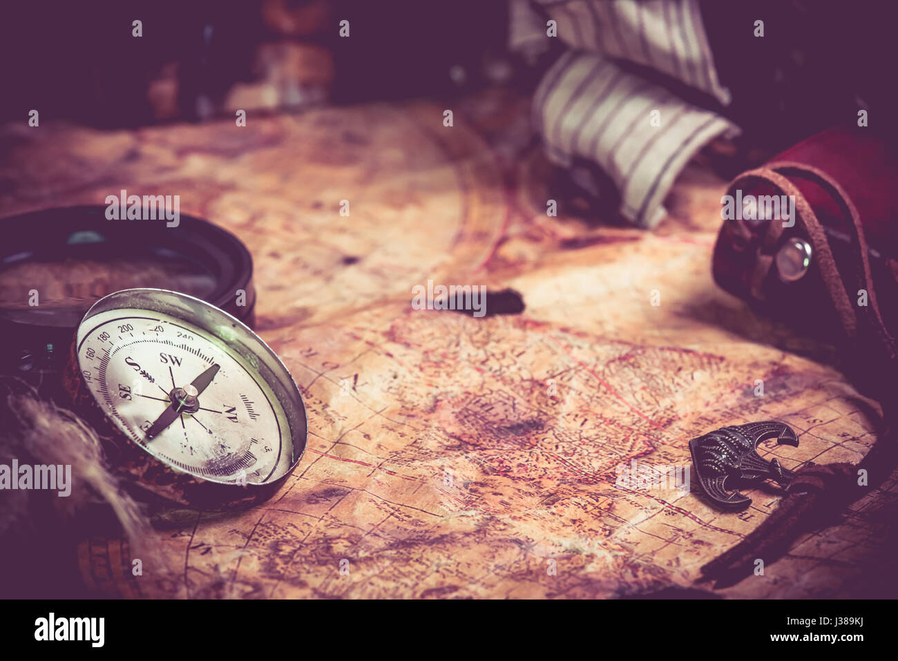 Columbus day and world map with compass Stock Photo - Alamy