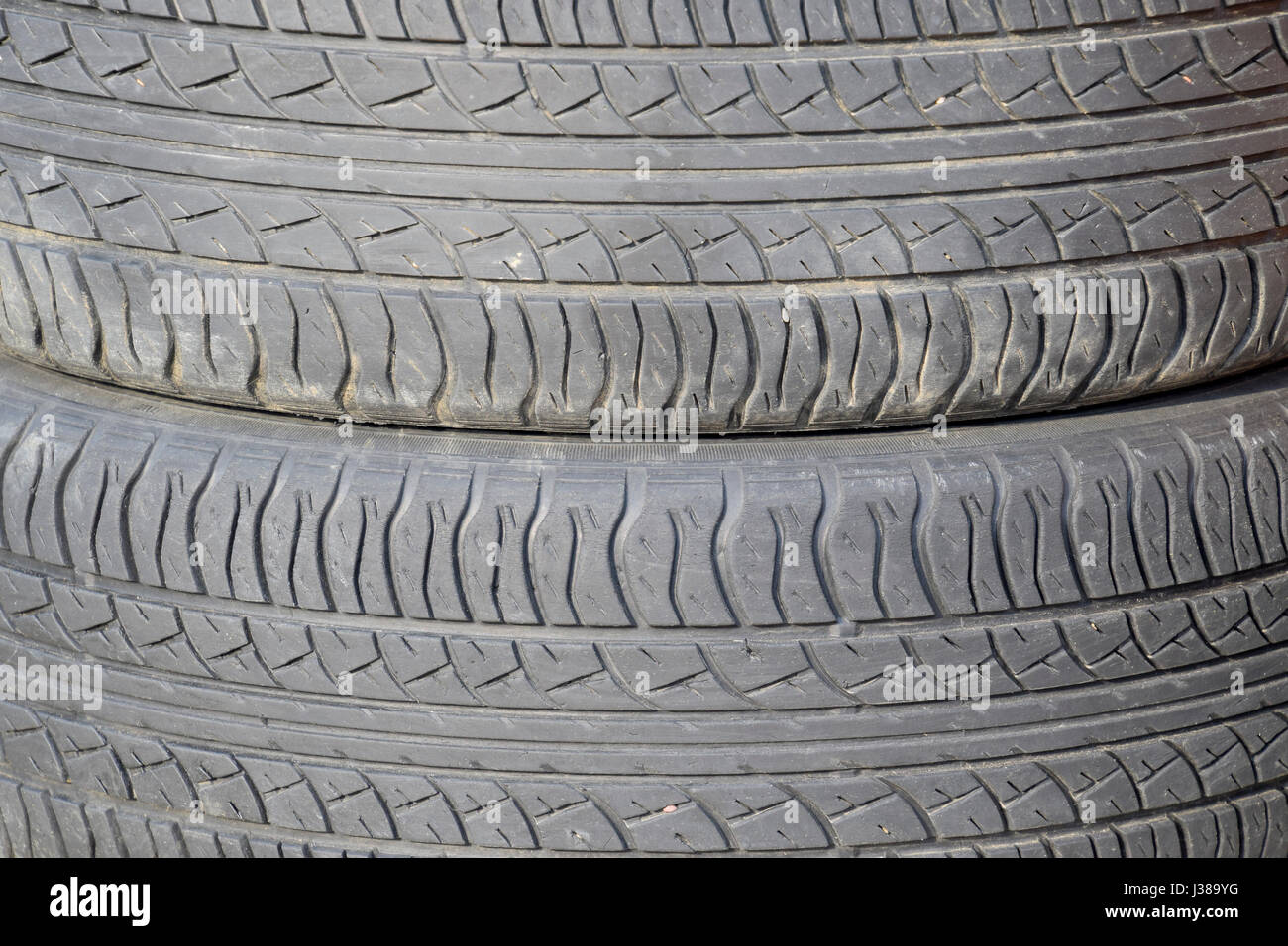The background of the tread pattern of the car wheel. Rubber tires ...
