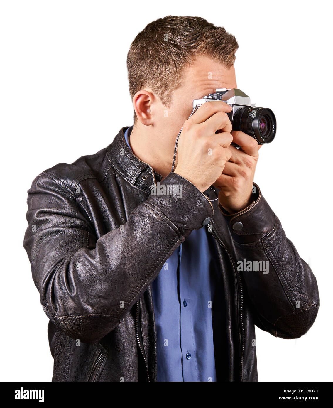 Side view from a young man with a leather jacket holding a vintage ...