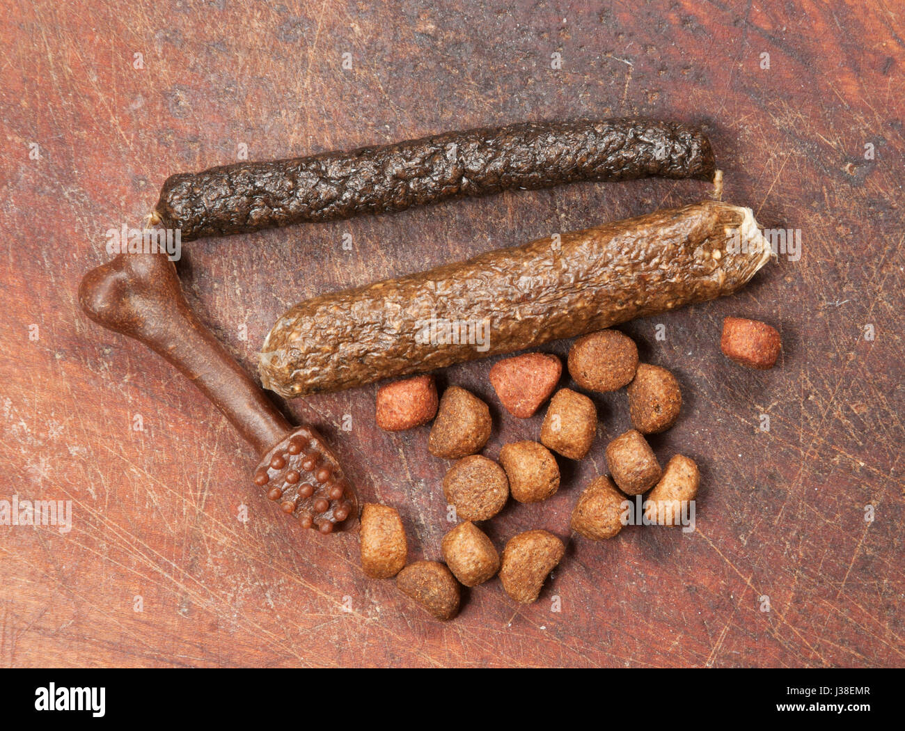 Dog dry food close up shot on board Stock Photo - Alamy