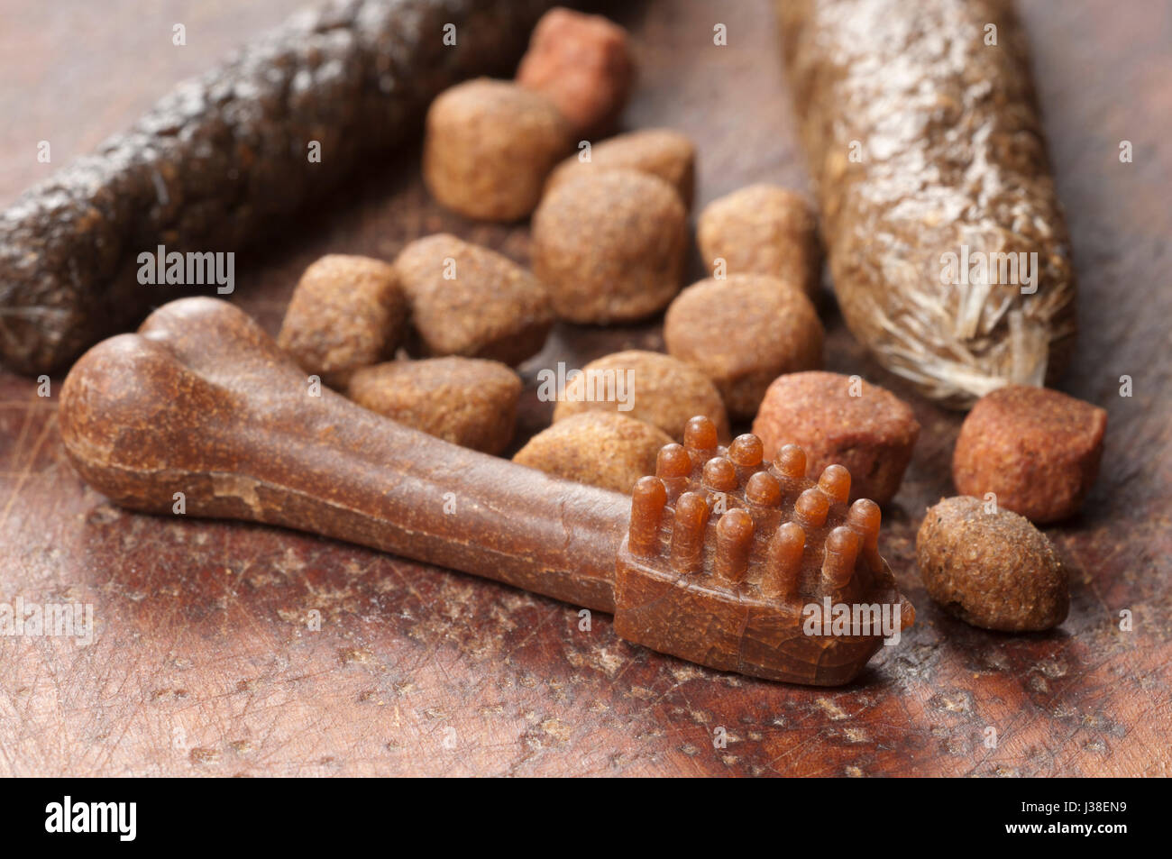Dog dry food close up shot on board Stock Photo - Alamy