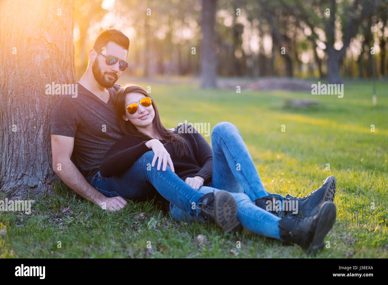 Love couple in the park Stock Photo - Alamy