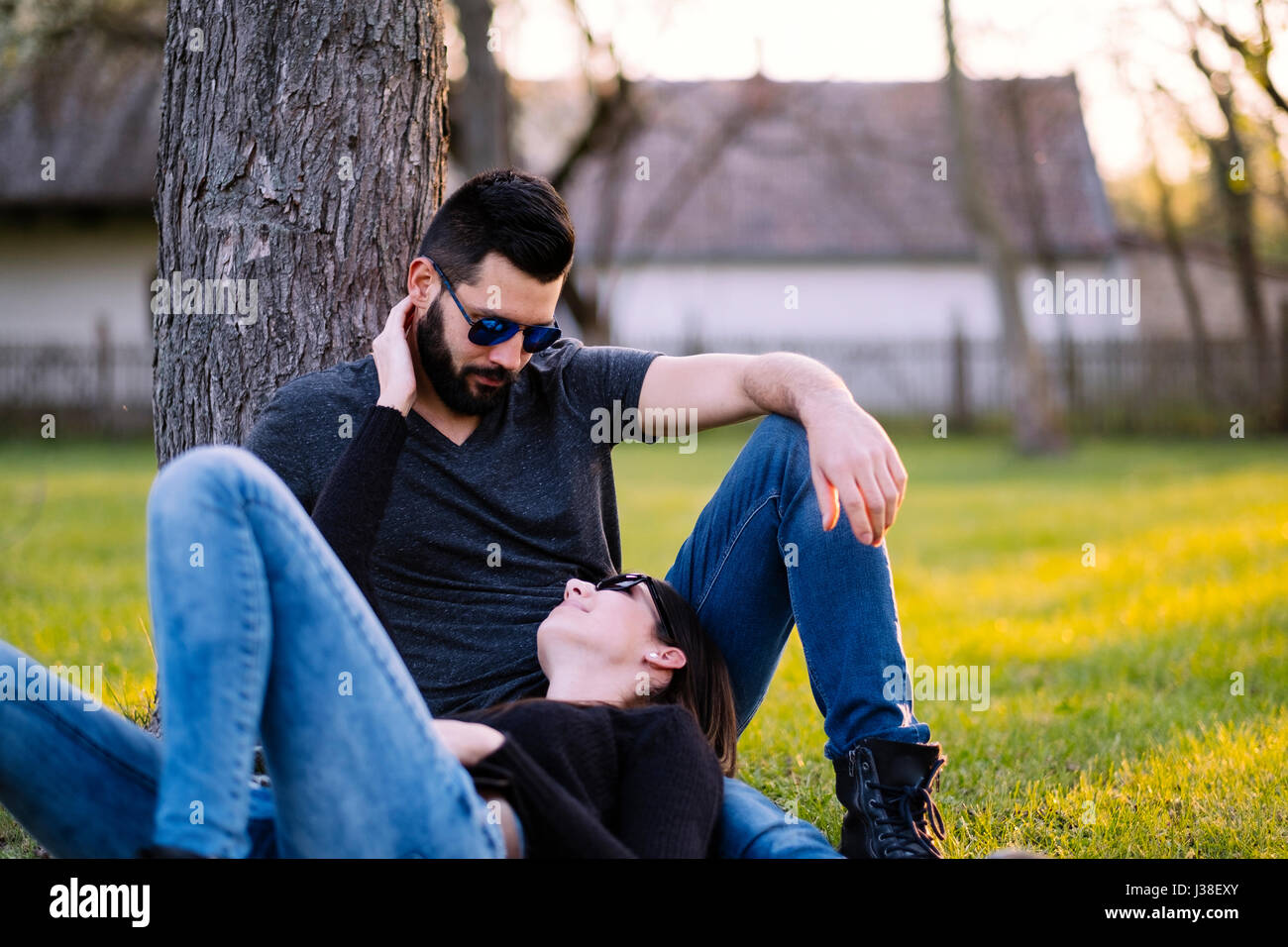 Love couple in the park Stock Photo - Alamy