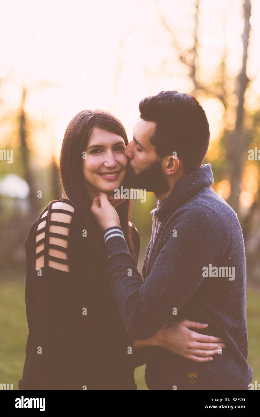 Love couple in the park Stock Photo - Alamy