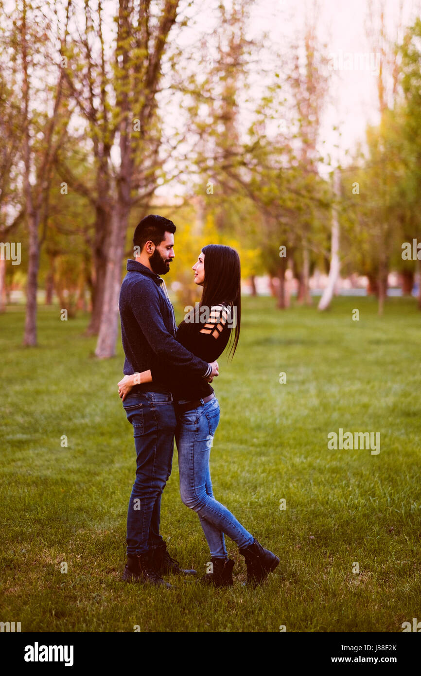 Love couple in the park Stock Photo - Alamy