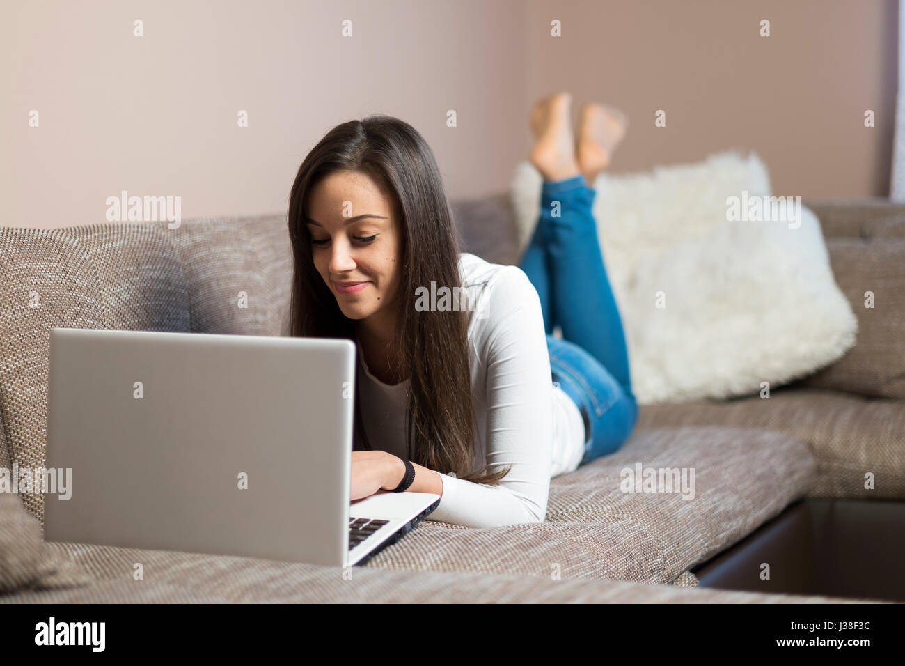 Woman use laptop at home Stock Photo - Alamy
