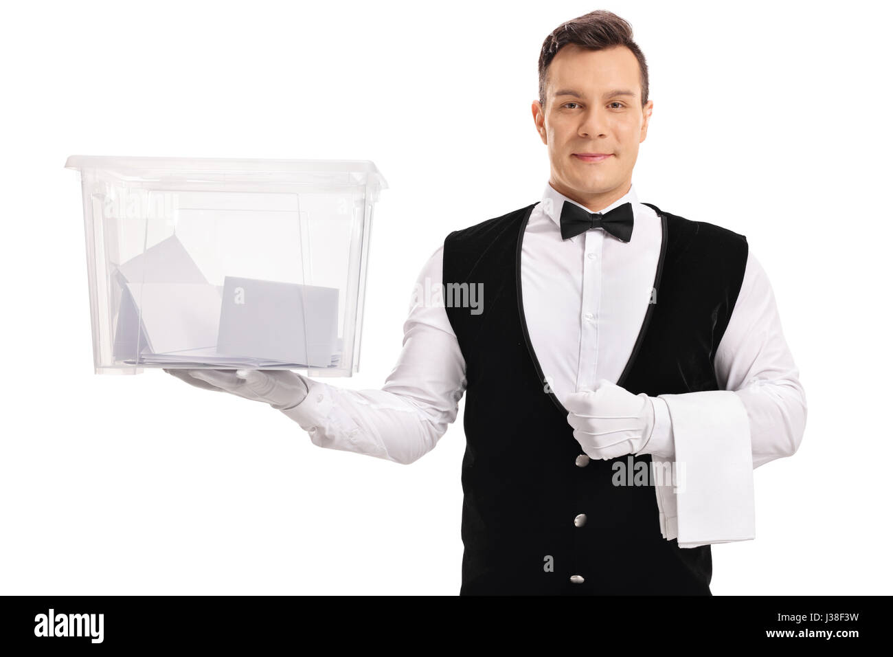 Butler holding a ballot box filled with votes isolated on white ...