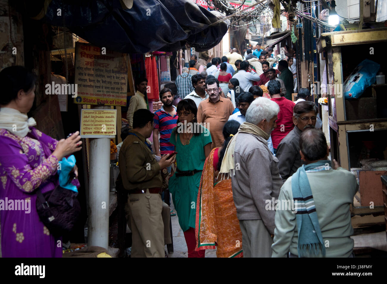 Crowds in the narrow streets of Varanasi, India Stock Photo - Alamy
