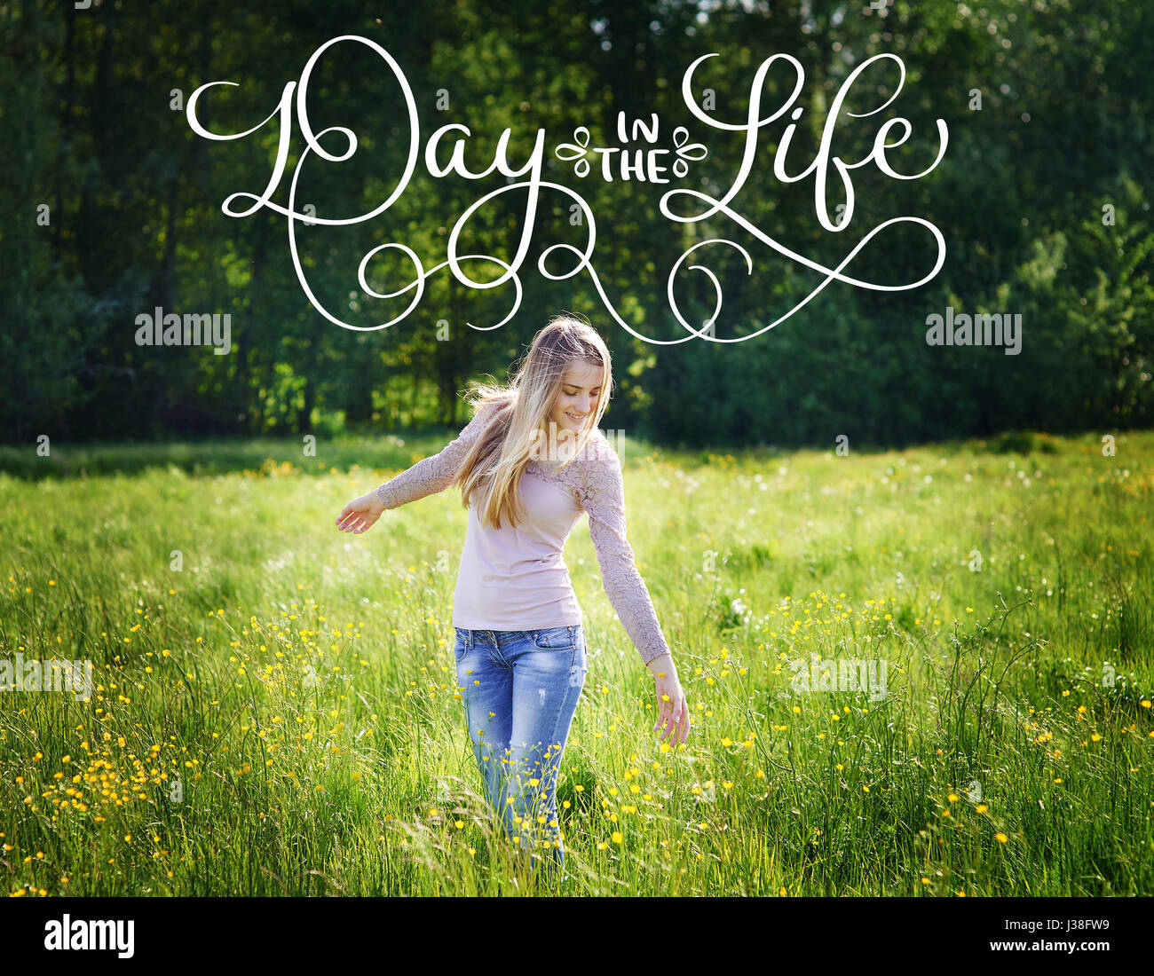 happy beautiful woman walking on a spring meadow and text Day in the ...