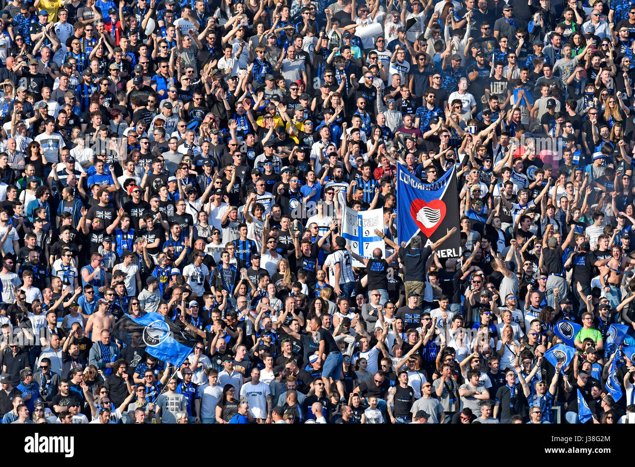 Atalanta's football fans cheering at the stadium, in Bergamo, Italy ...