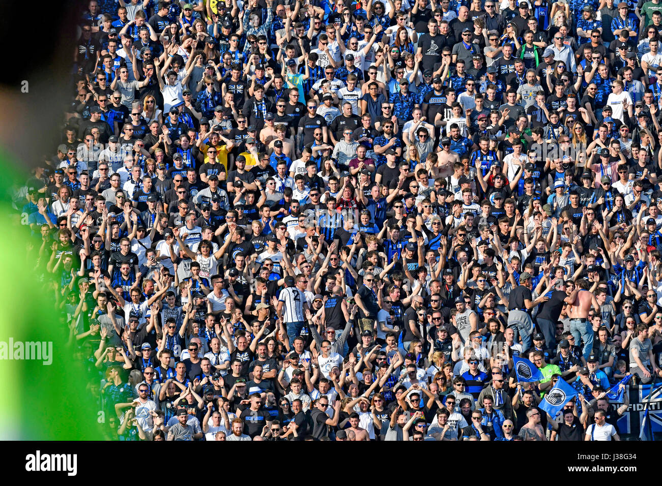 Atalanta's football fans cheering at the stadium, in Bergamo, Italy ...