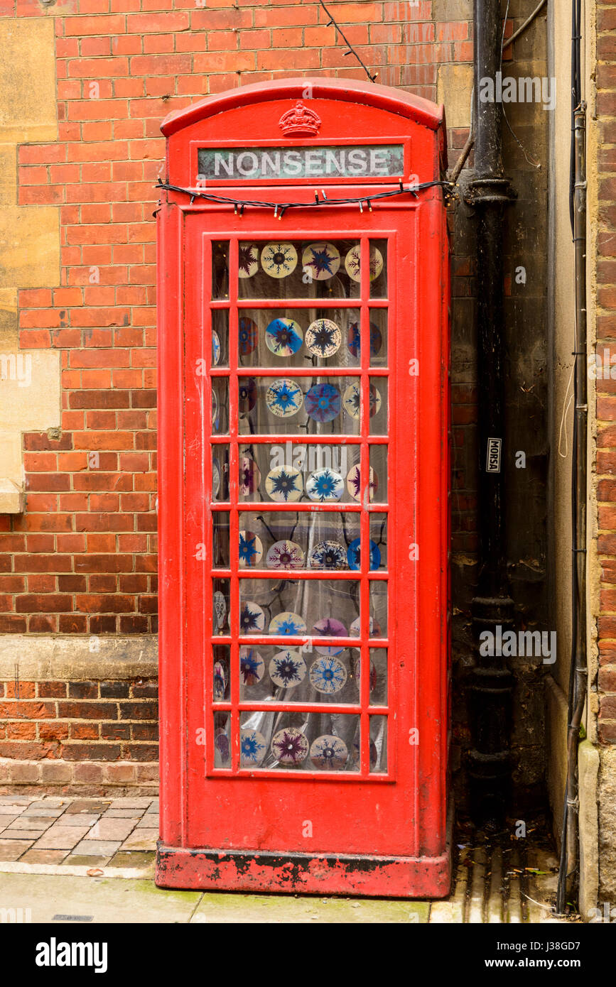 Red telephone boxes converted to other uses Stock Photo - Alamy