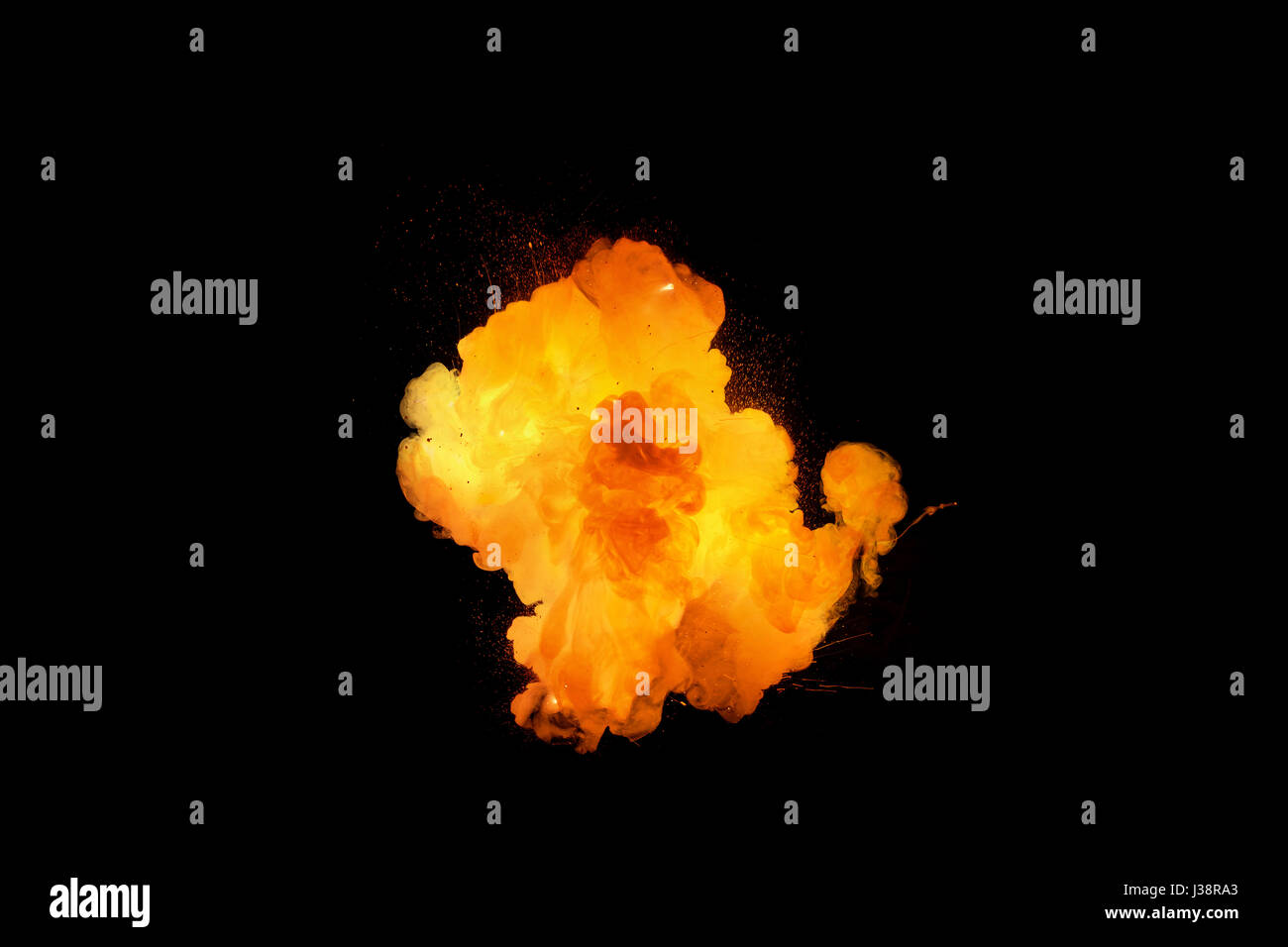 Realistic fiery explosion, orange color with sparks isolated on black ...