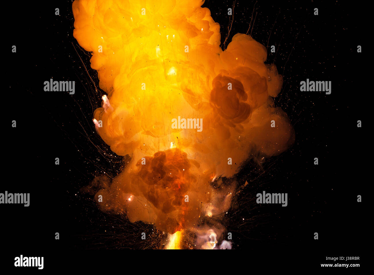 Realistic fiery explosion, orange color with sparks isolated on black ...