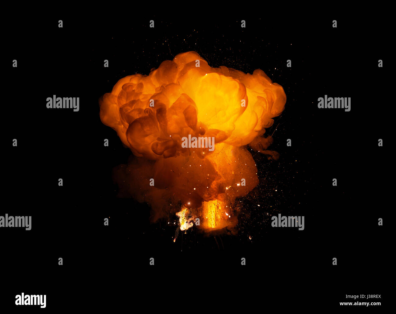 Realistic fiery explosion, orange color with sparks isolated on black ...