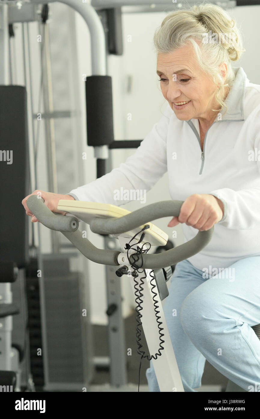 Beautiful elderly woman in a gym Stock Photo - Alamy