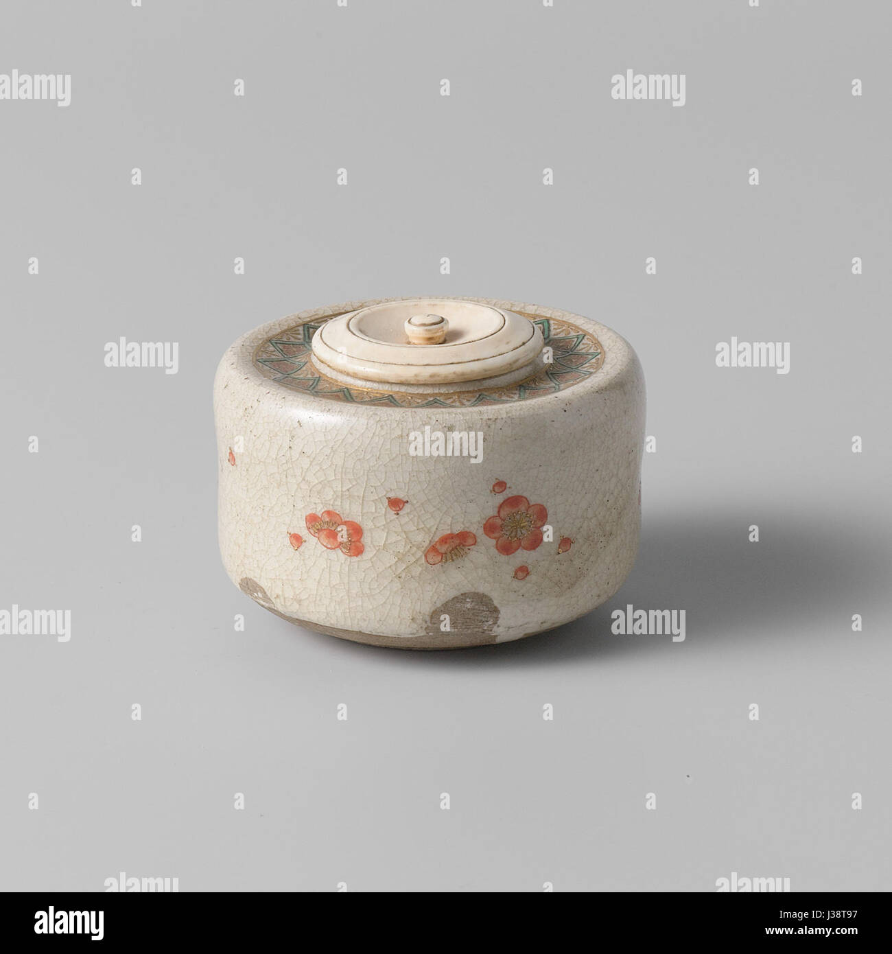 This cylindrical chair, with cherry blossom designs in red enamel and ...