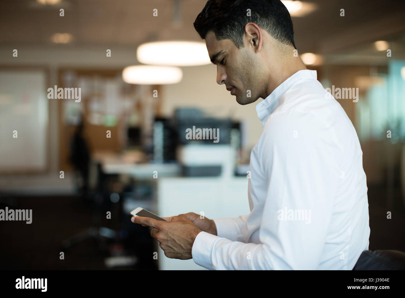 Businessman using cellphone gesturing hi-res stock photography and ...