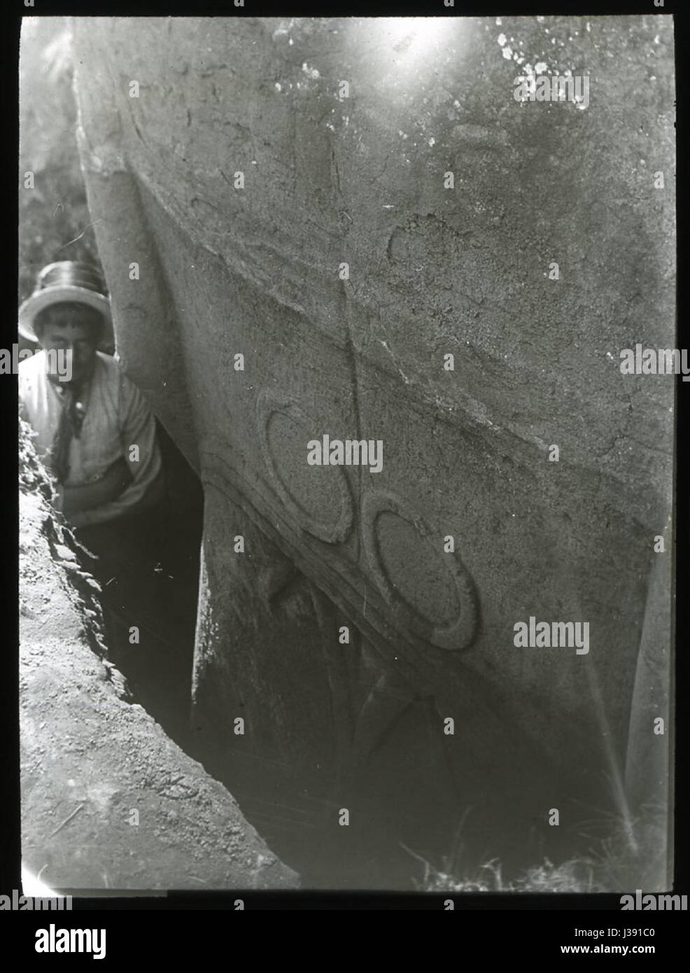 Close up view of the back of a moai excavated but still standing ...