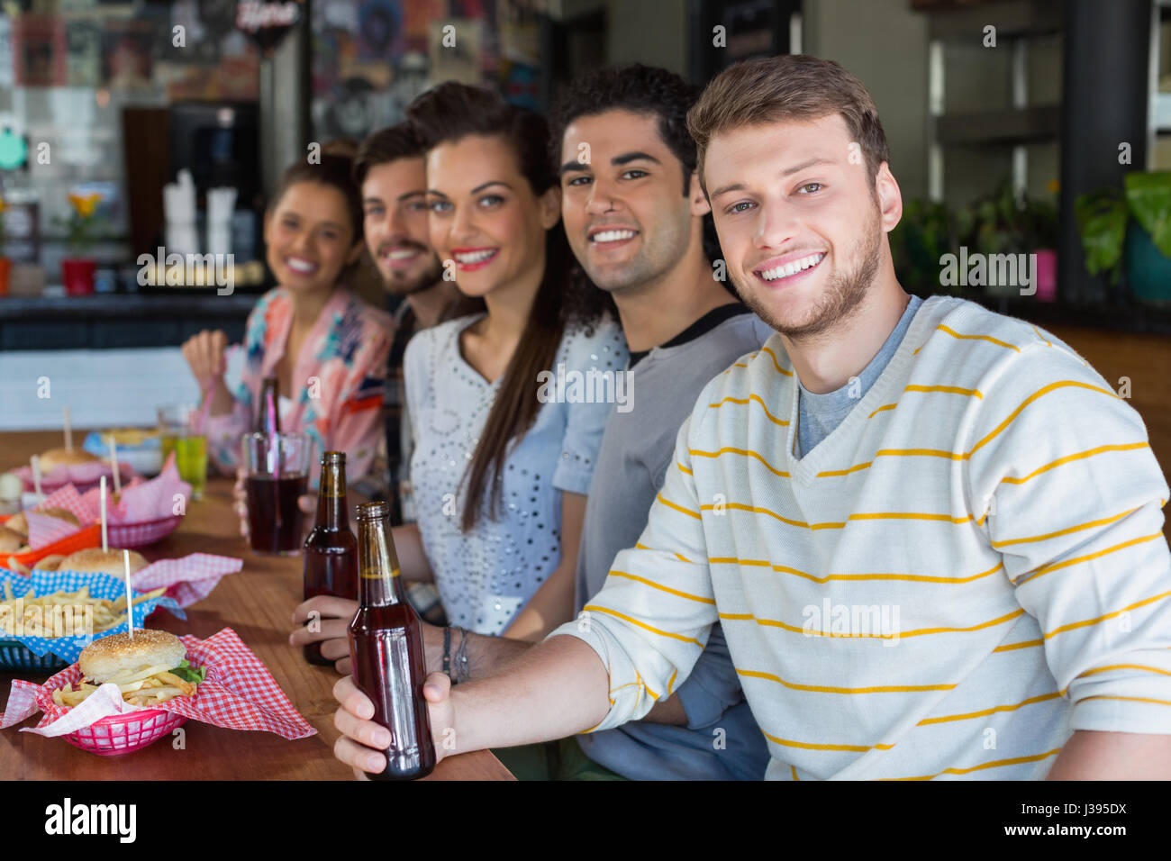 Friends having lunch in pub hi-res stock photography and images - Alamy