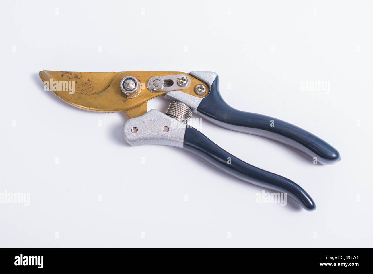 Used rusty pruning shears on white background Stock Photo - Alamy