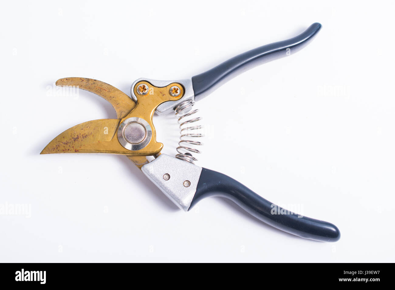 Used rusty pruning shears on white background Stock Photo - Alamy
